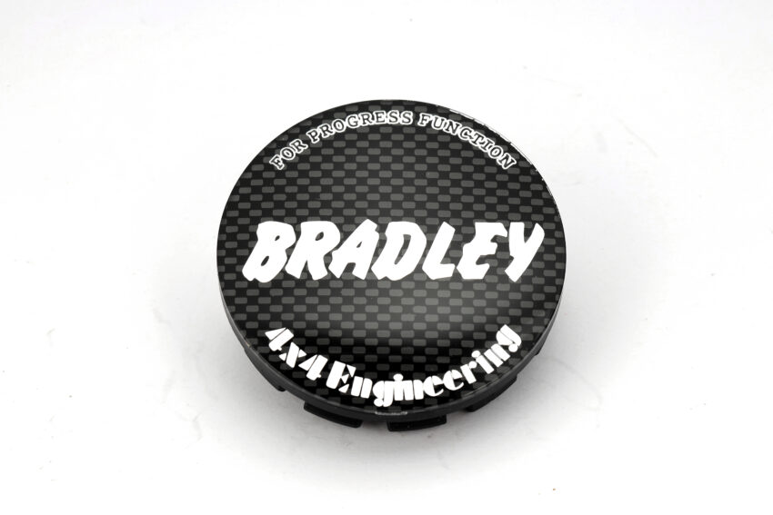 Bradley π (pi) center cap design change. - 4x4 Engineering Service
